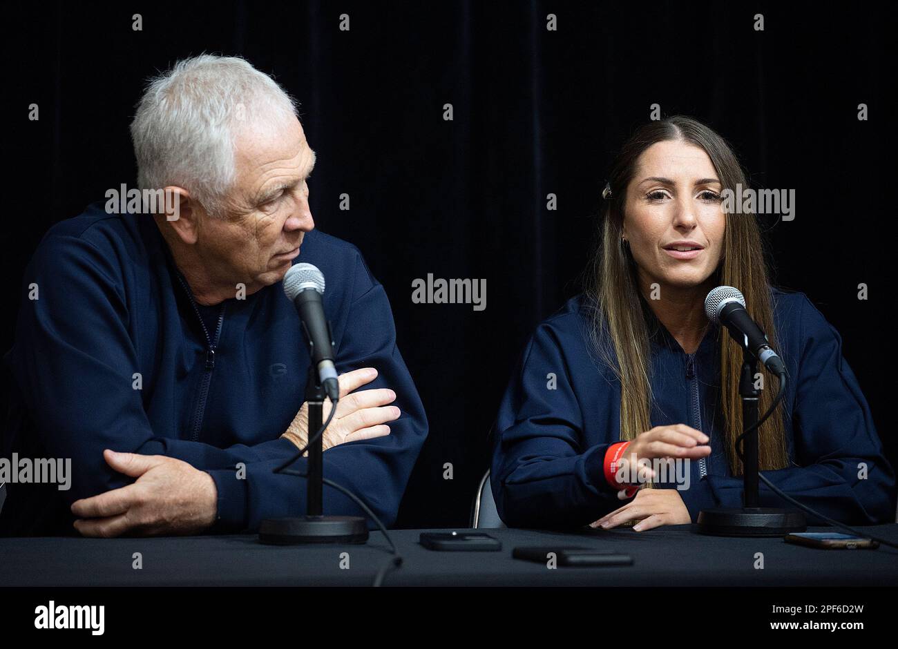 Promoter Yvon Michel, left, looks on as boxer Kim Clavel speaks during ...
