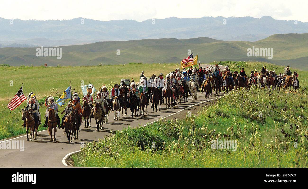 Crow riders ascend Last Stand Hill on their way to the dedication of a ...