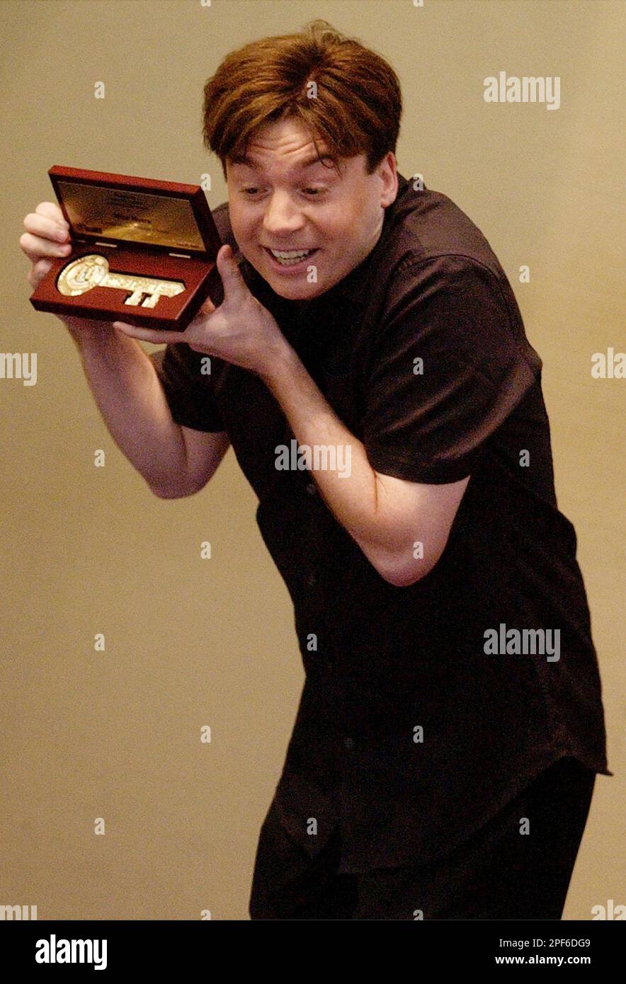 Actor Mike Myers poses after being presented with a key to the city of ...