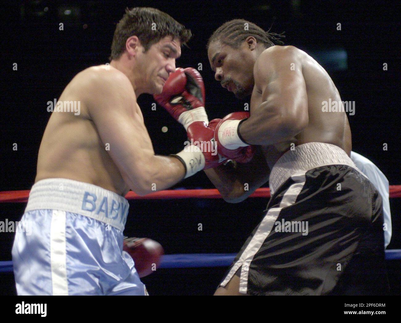 Joe Mesi, left, battles Robert Davis during their fight for the North ...