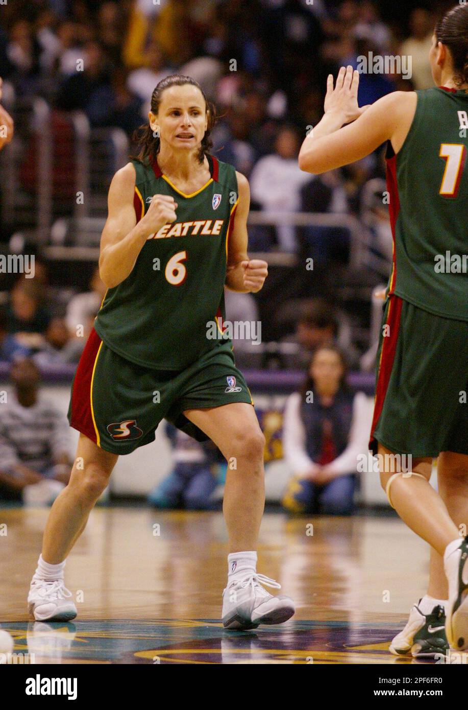 Seattle Storm's Sandy Brondello celebrates with Sue Bird in the closing ...