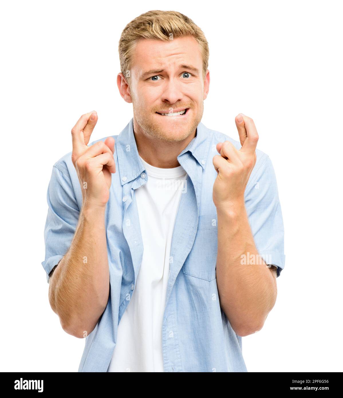 Nervous man crossing fingers hi-res stock photography and images - Alamy