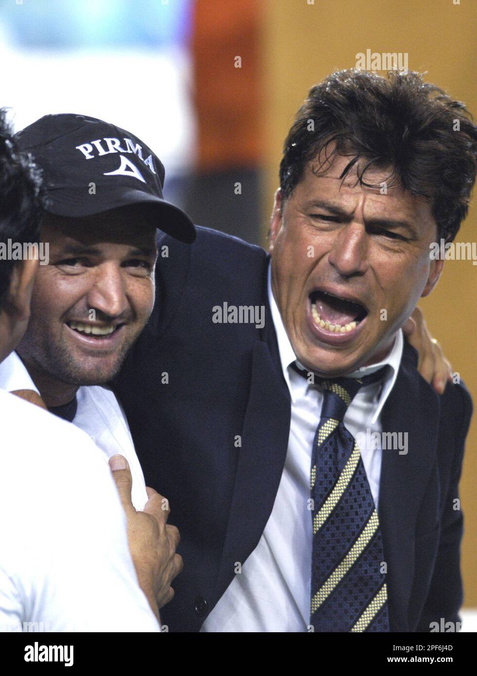 Monterrey's coach Daniel Passarella, right, celebrates with soccer ...