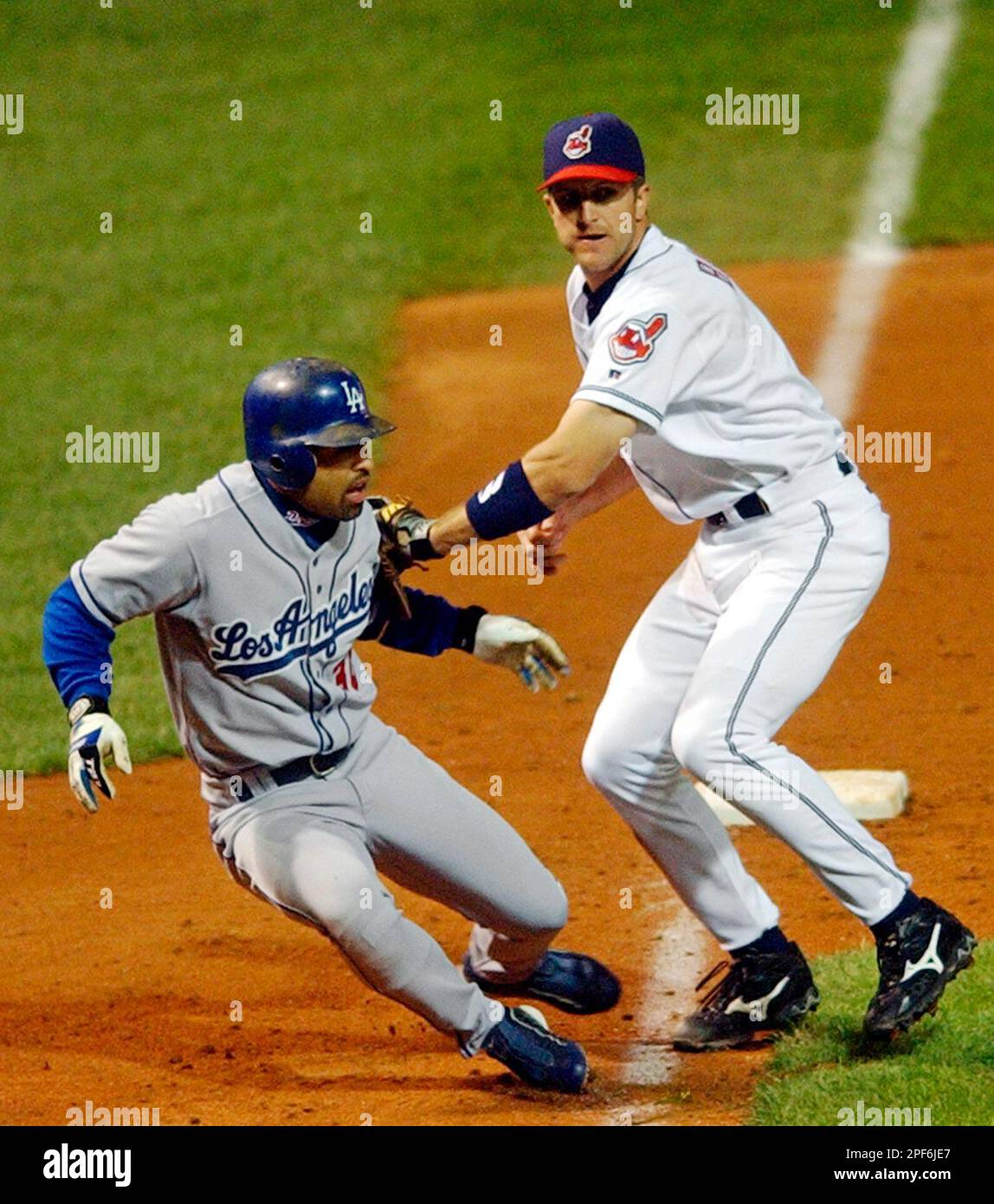 Cleveland Indians third baseman Casey Blake, right, tags out Los ...