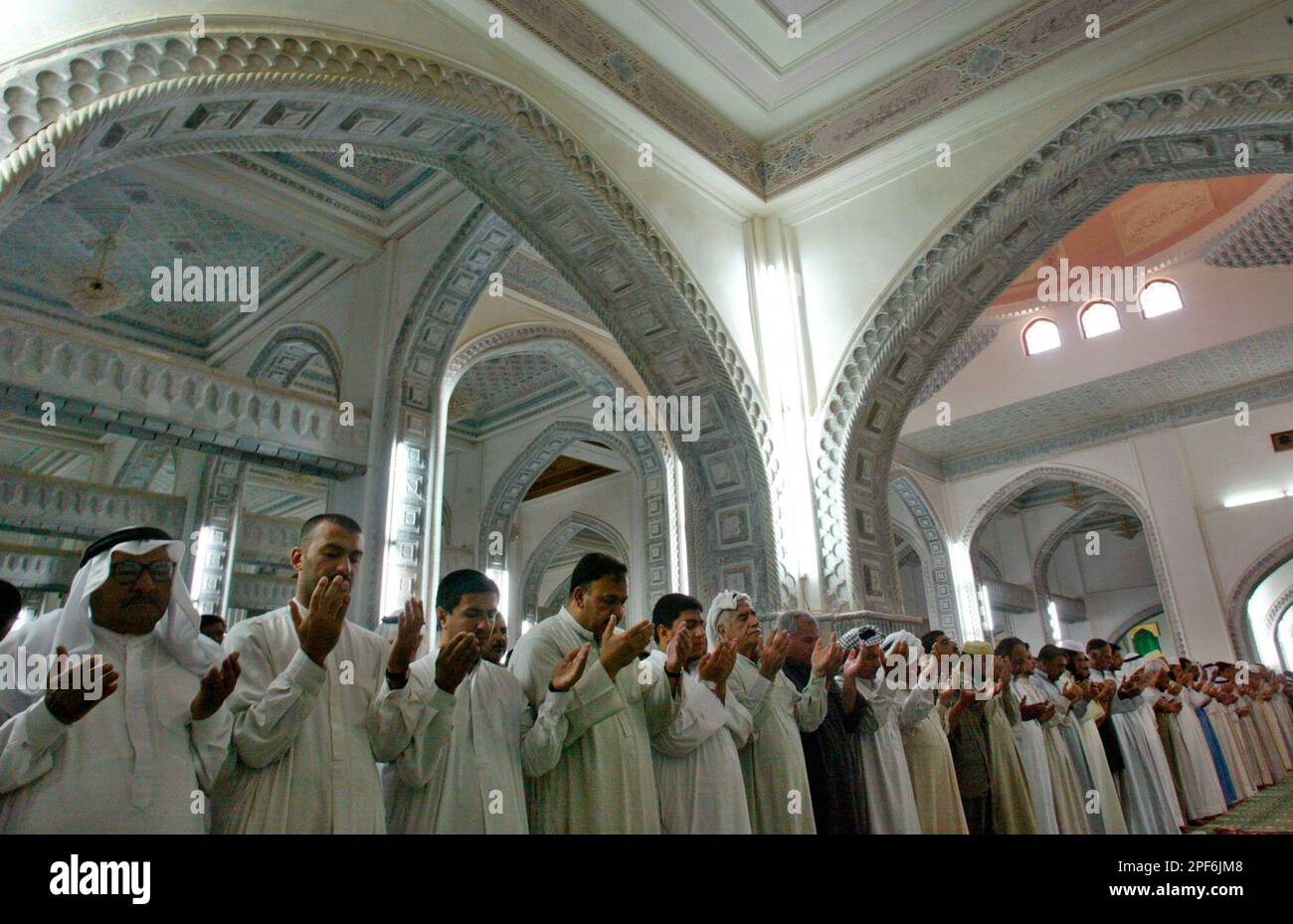Muslims pray at the Saddam Hussein mosque in Tikrit, Iraq, Friday June ...
