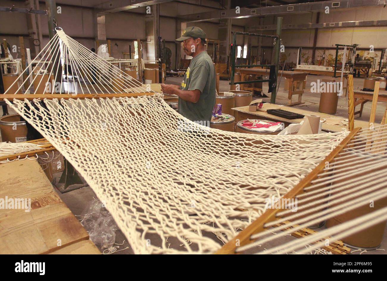 **ADVANCE FOR SUNDAY, JUNE 15** Lewis Grate puts the finishing touch on ...