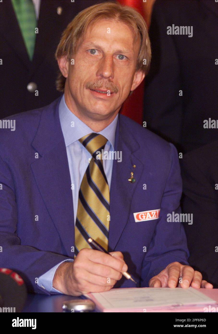 Turkish first-division team Fenerbahce's new coach Christoph Daum signs ...