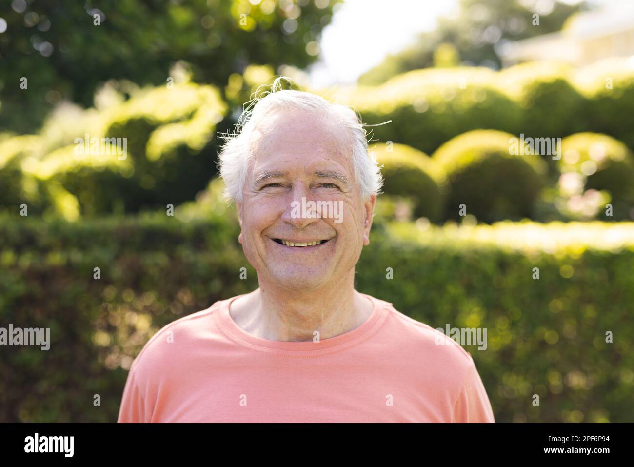 Happy senior man looking camera hi-res stock photography and images - Alamy