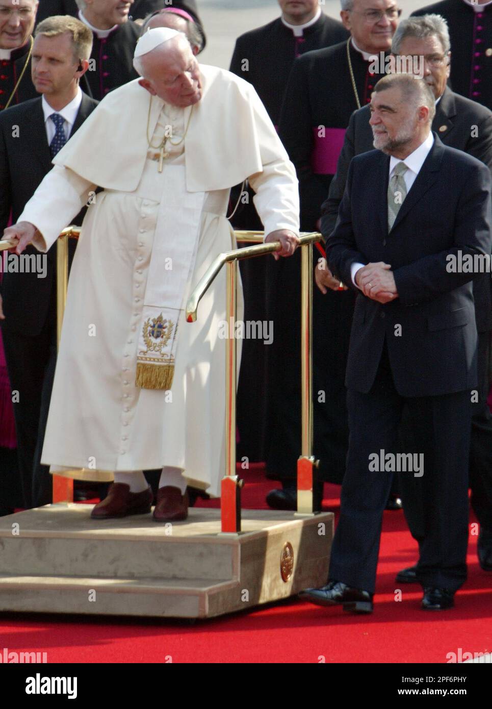 Pope John Paul II, left, the most traveled pontiff in history, is ...