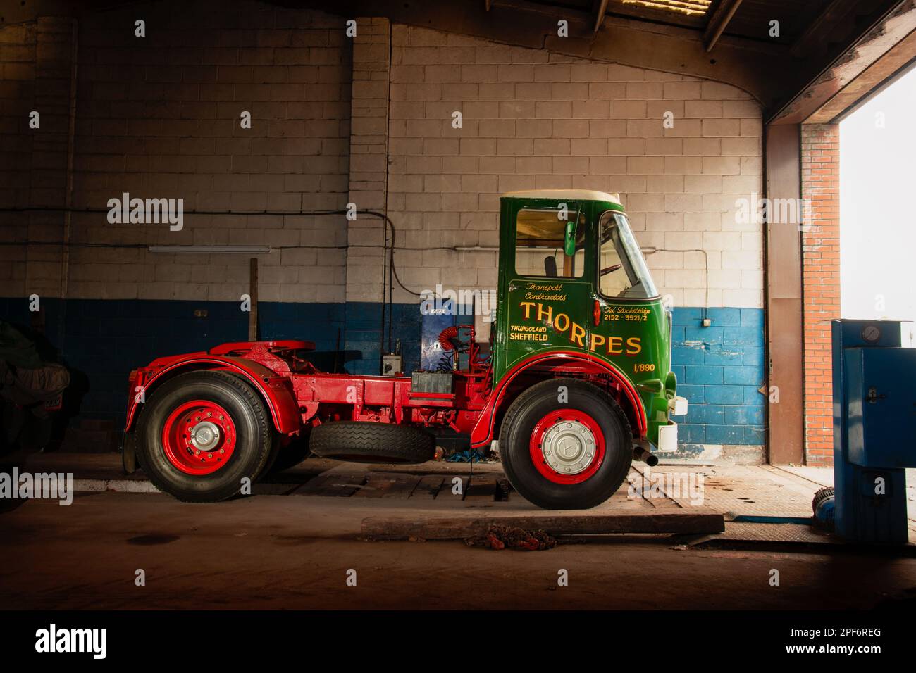 Classic British Atkinson truck parked in a haulier's garage Stock Photo ...