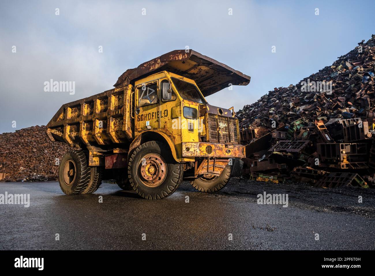 Foden FL Dump Truck parked next to a large mound of scrap steel and ...