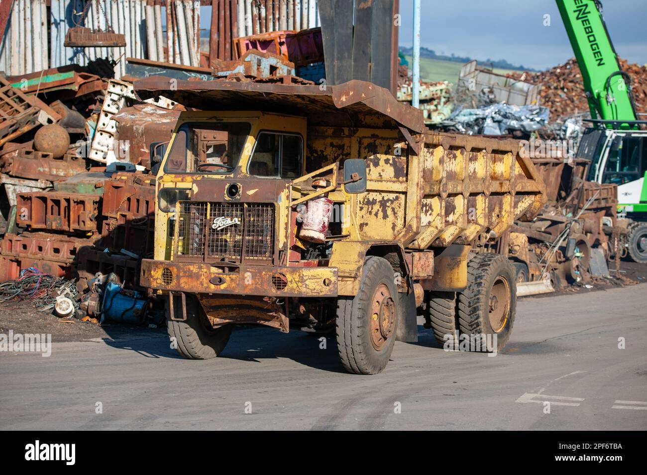 Foden FL Dump Truck parked next to stock piled scrap steel with a ...