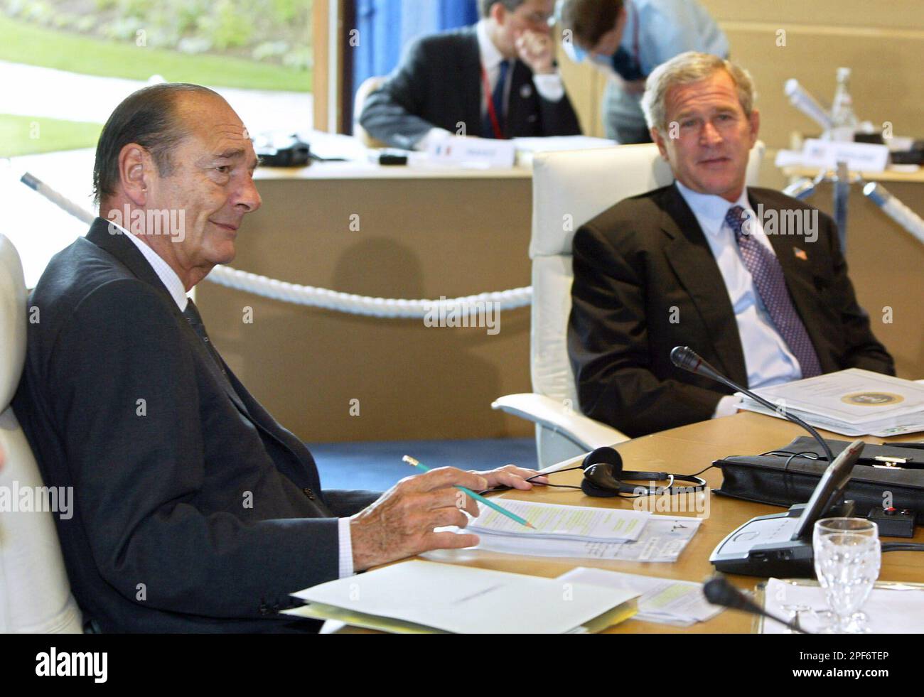 U.S. President George W. Bush, right, looks on as French President ...