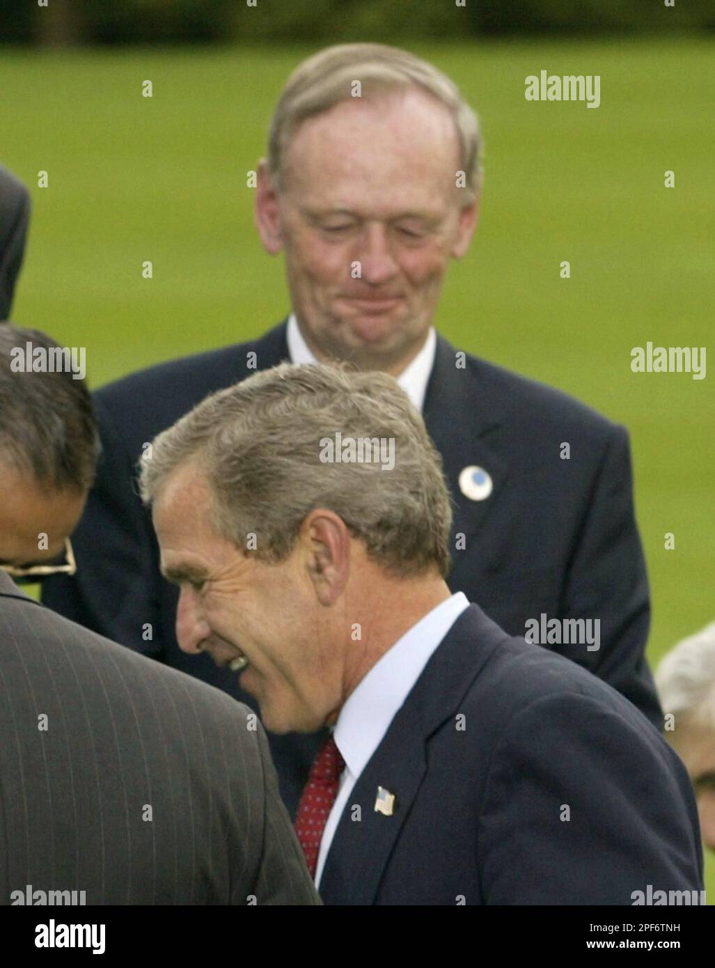 Canadian Prime Minister Jean Chretien grins as United States President ...