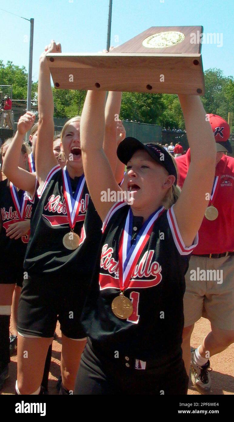 Kirbyville's Ashley Goodwin holds the trophy her team won by beating ...