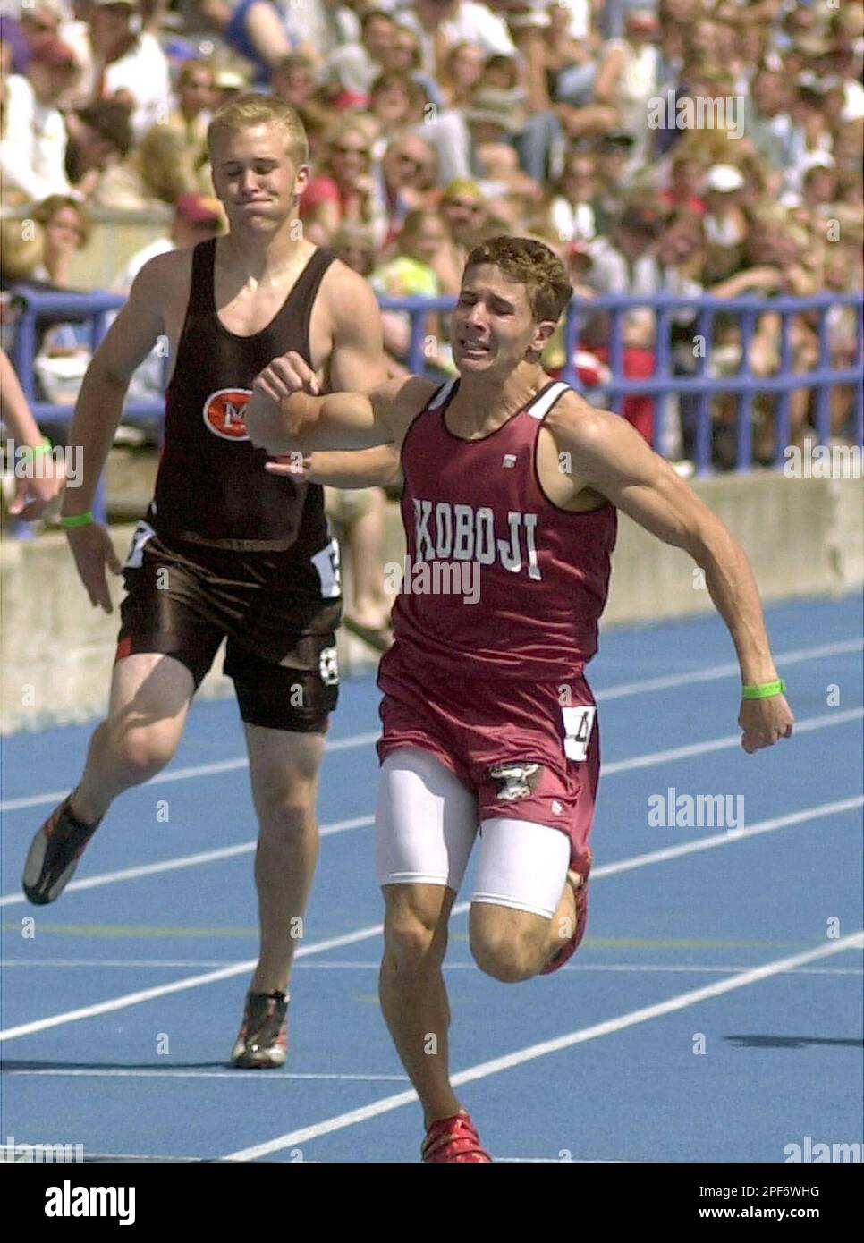 Okoboji's Zac Bailey, right, wins the Class 2A 100 Meter Dash by edging ...