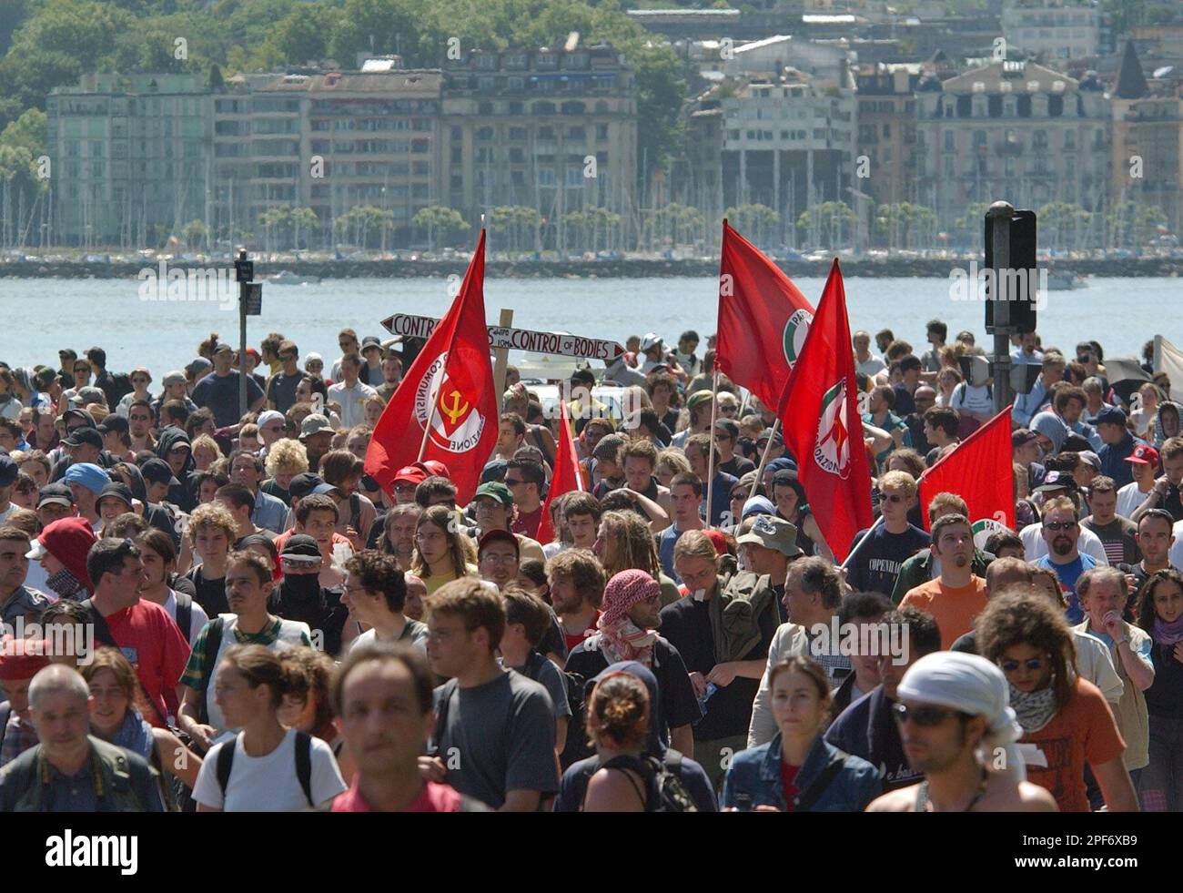 Group of Eight (G8) protesters march along Lake Geneva in Geneva ...