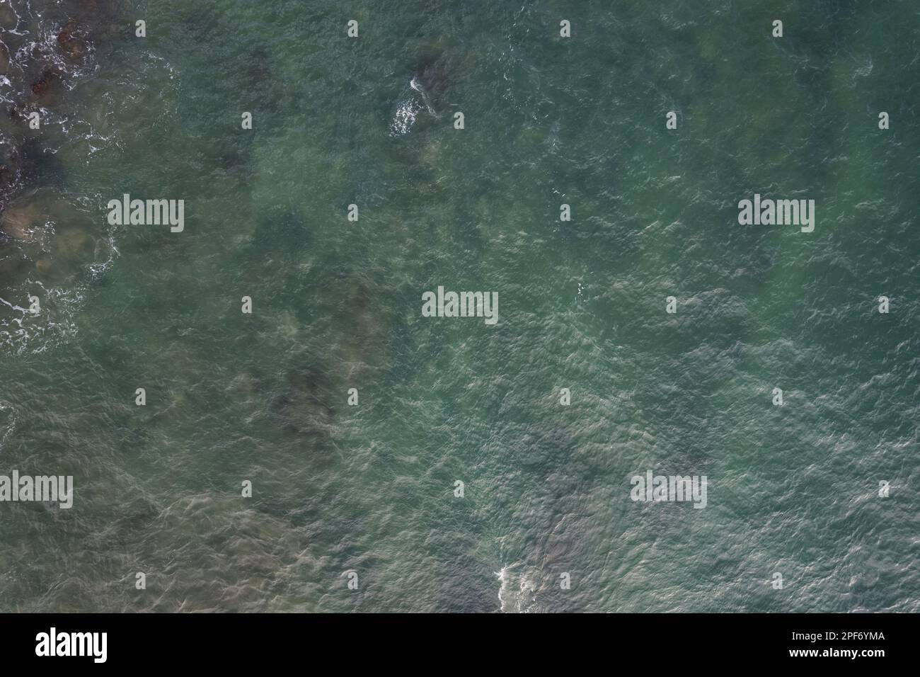 Green abstract sea water texture above top view Stock Photo - Alamy