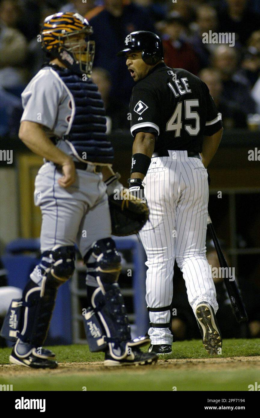Detroit Tigers' catcher Brandon Inge, left, looks to the mound as ...