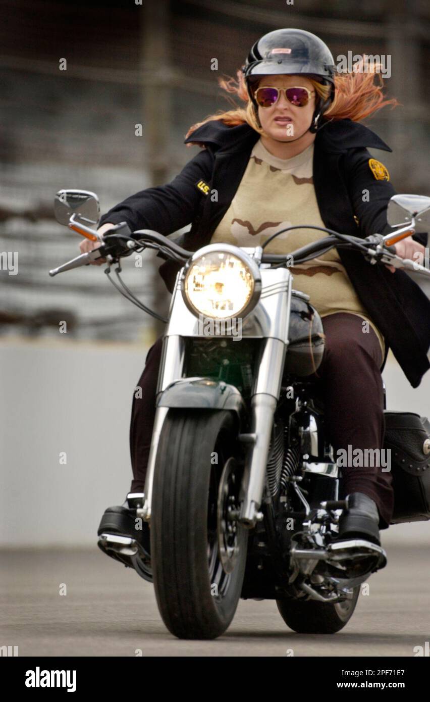 Wynonna Judd cruises down the straightaway at the Indianapolis Motor ...
