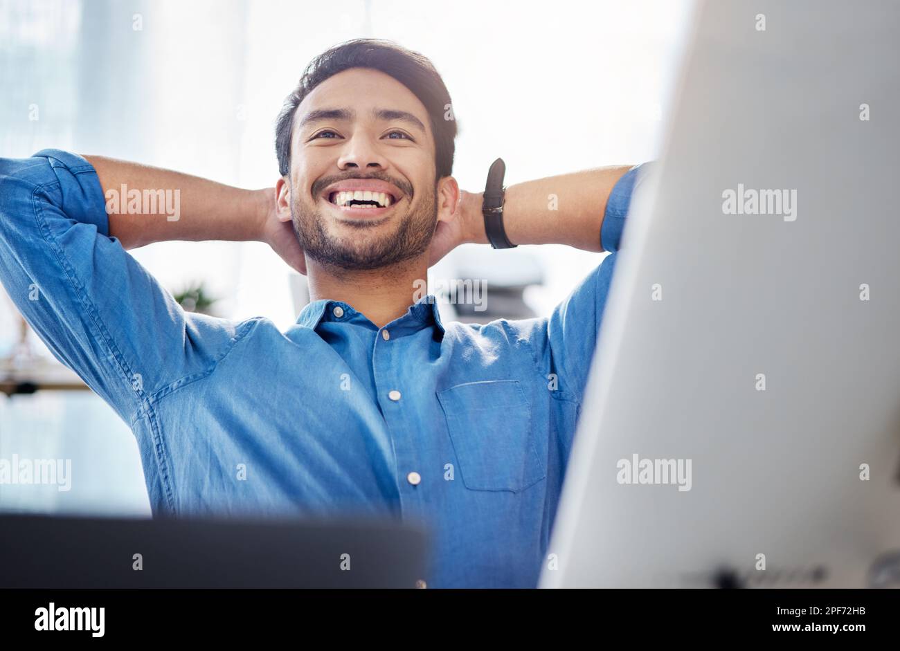 Happy man, thinking and stretching in office to relax for motivation ...