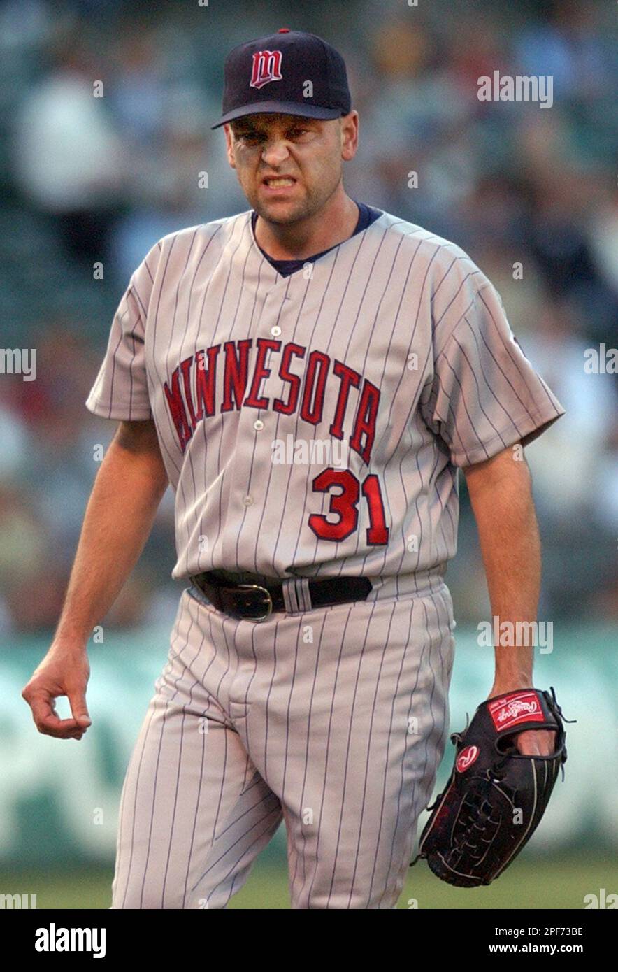 Minnesota Twins pitcher Rick Reed grimaces after striking out Oakland ...