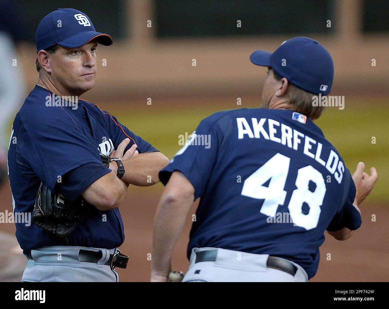 San Diego Padres' new pitching coach Darren Balsley, left, talks to ...