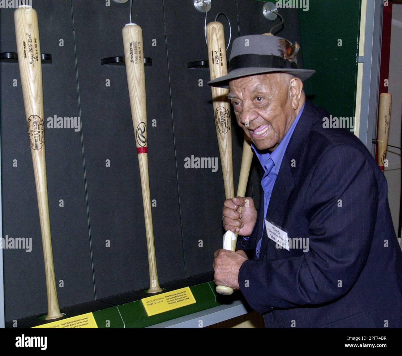 Ted "Double Duty" Radcliffe, 100, shows his form while visiting the ...