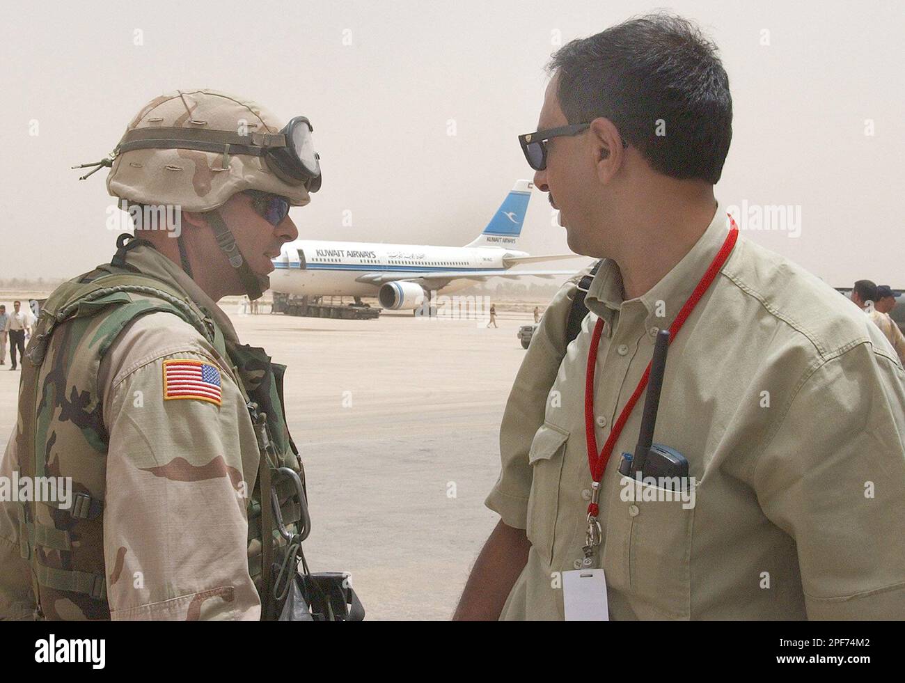 Kuwaiti Lt. Col. Faisal Al Jassar, right, talks with U.S. Army Major ...