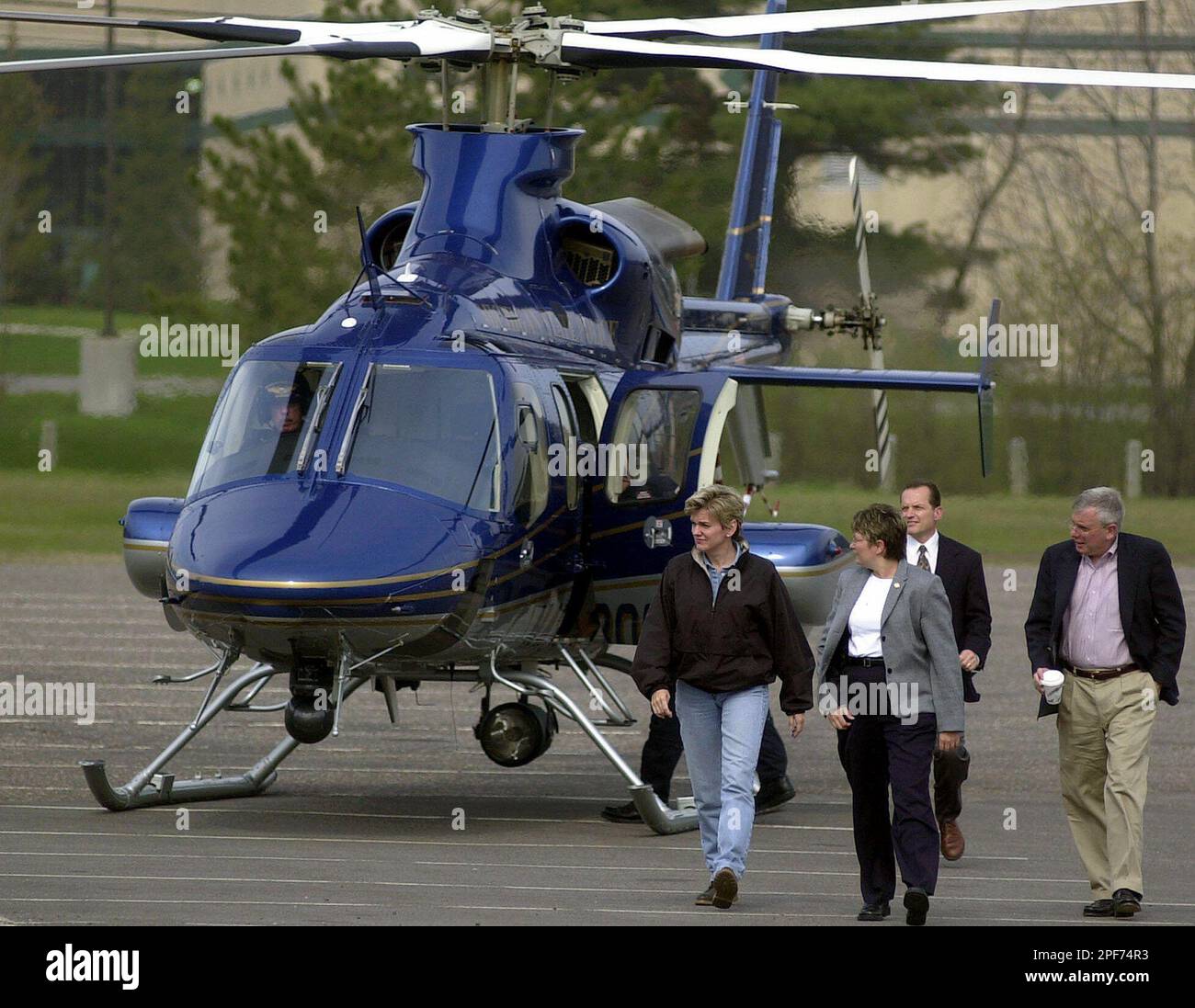 Michigan Gov. Jennifer Granholm, left, arrives in Marquette, Mich ...