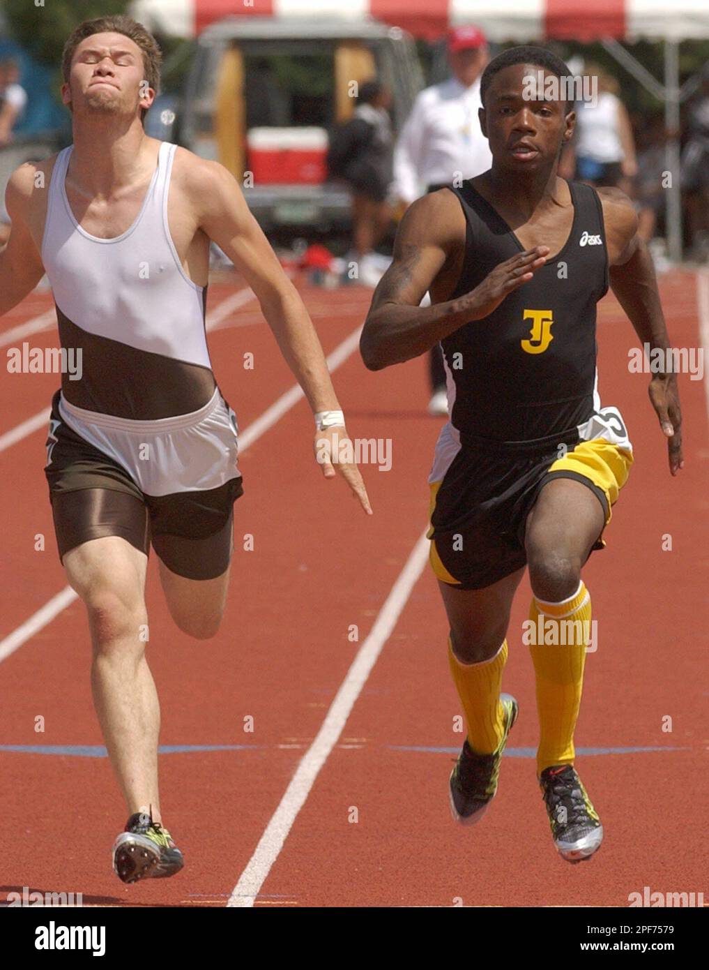 Thomas Jefferson's DeWayne Lewis, right, wins the Class 5A boys 100 ...