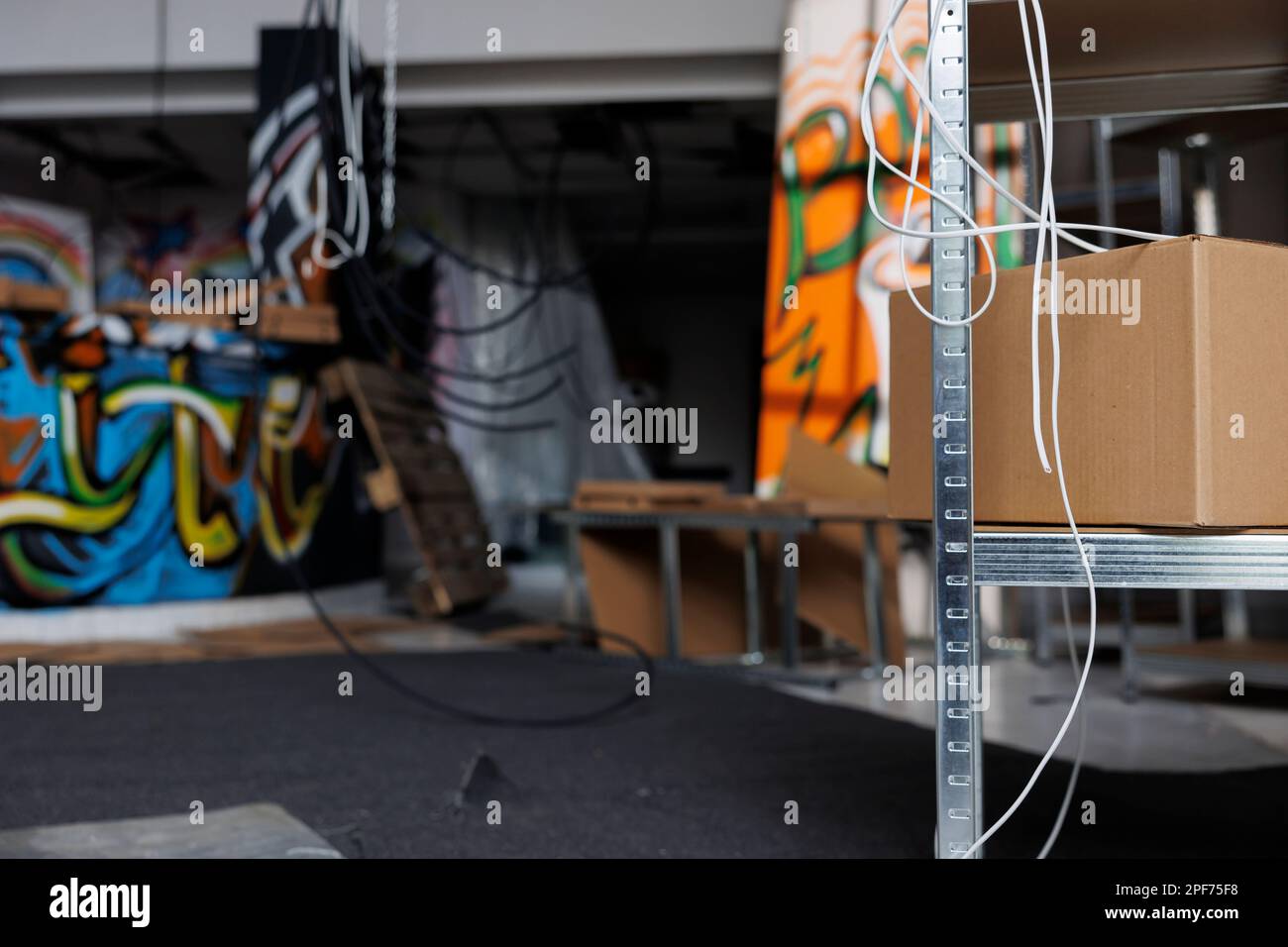 Destroyed structure of messy building covered in debris and neglect ...