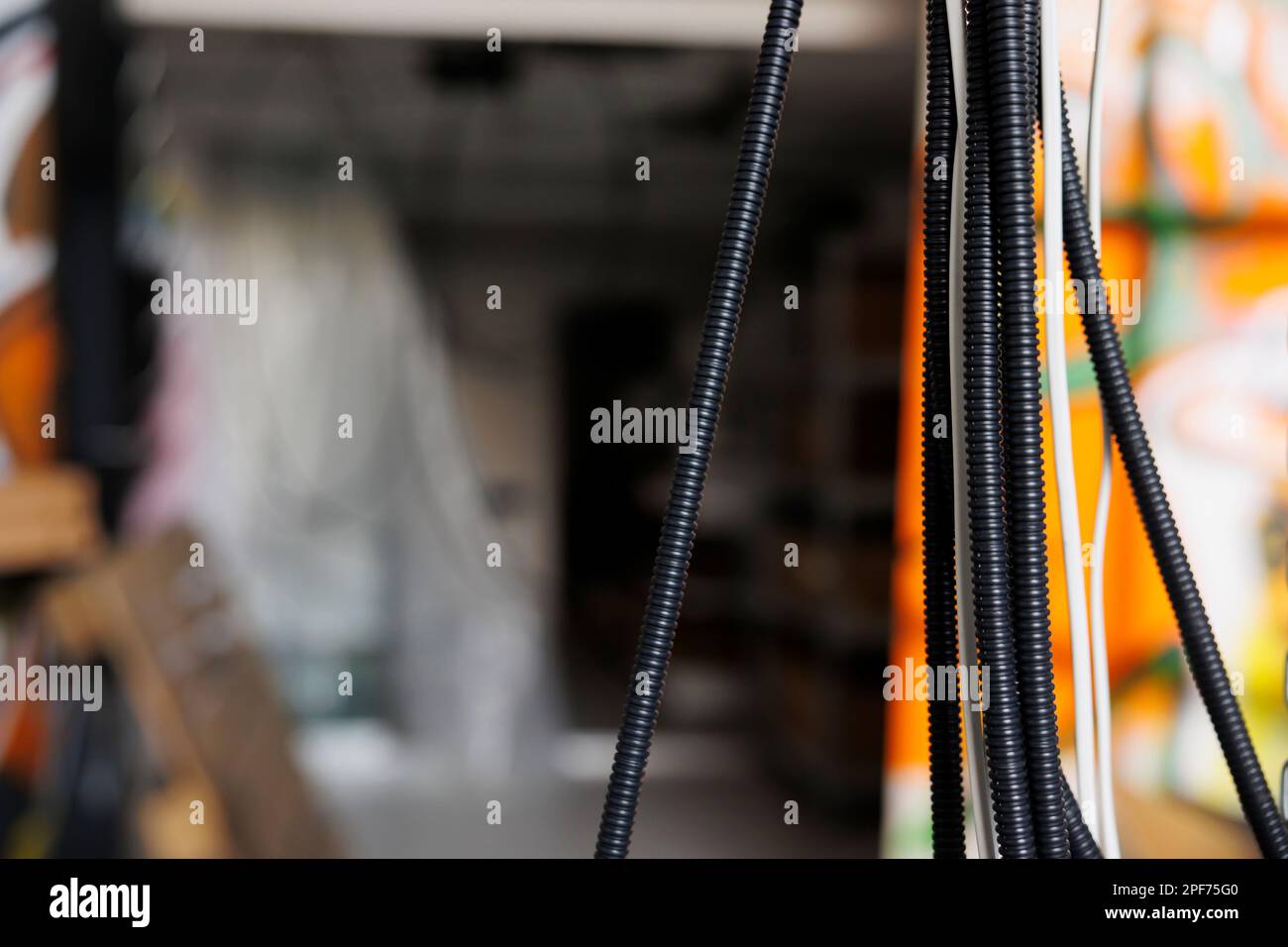 Decaying structure of neglected building in ruins, artistic spray paint ...