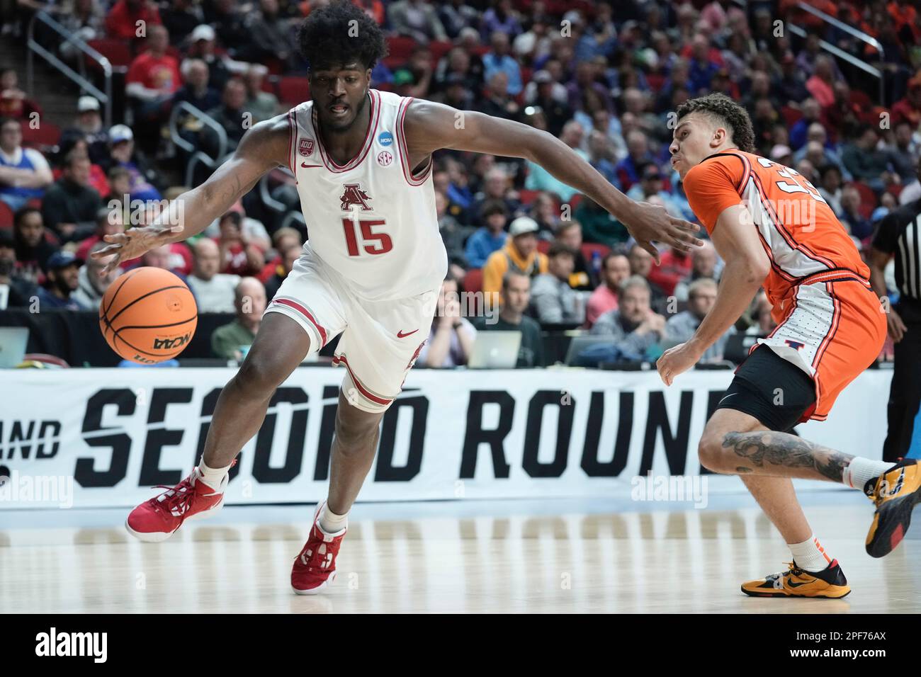 Arkansas's Makhi Mitchell gets by Illinois's Coleman Hawkins during the ...
