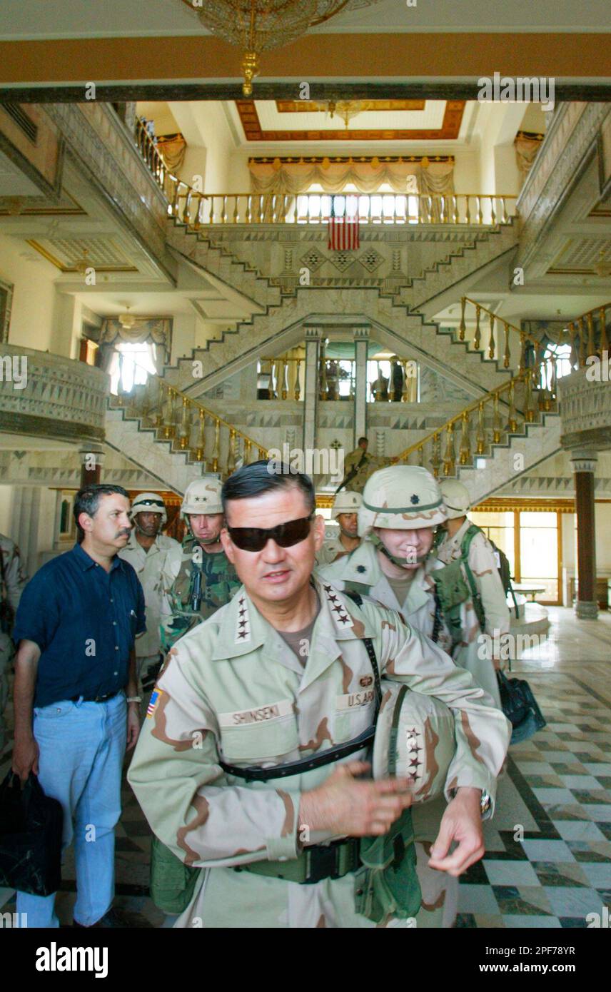 US Army Chief of Staff Eric K. Shinseki, comes out of one of Saddam ...