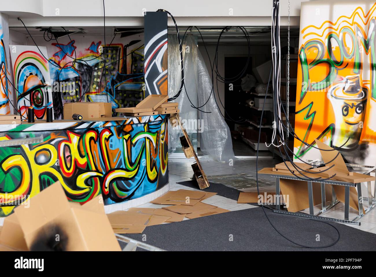 Creepy grungy atmosphere of deserted old building filled with spray ...