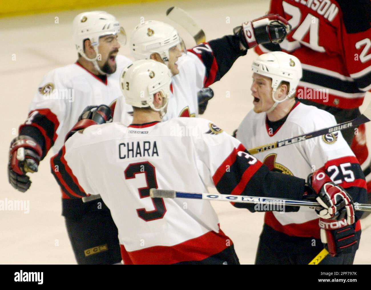 Ottawa Senators' Chris Phillips, left, Zdeno Chara, and Bryan Smolinski ...