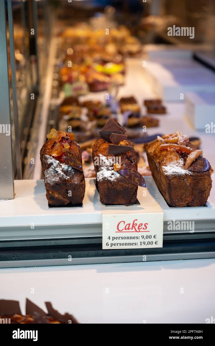 Assortment of french fresh baked sweet pastry with fresh fruits and ...