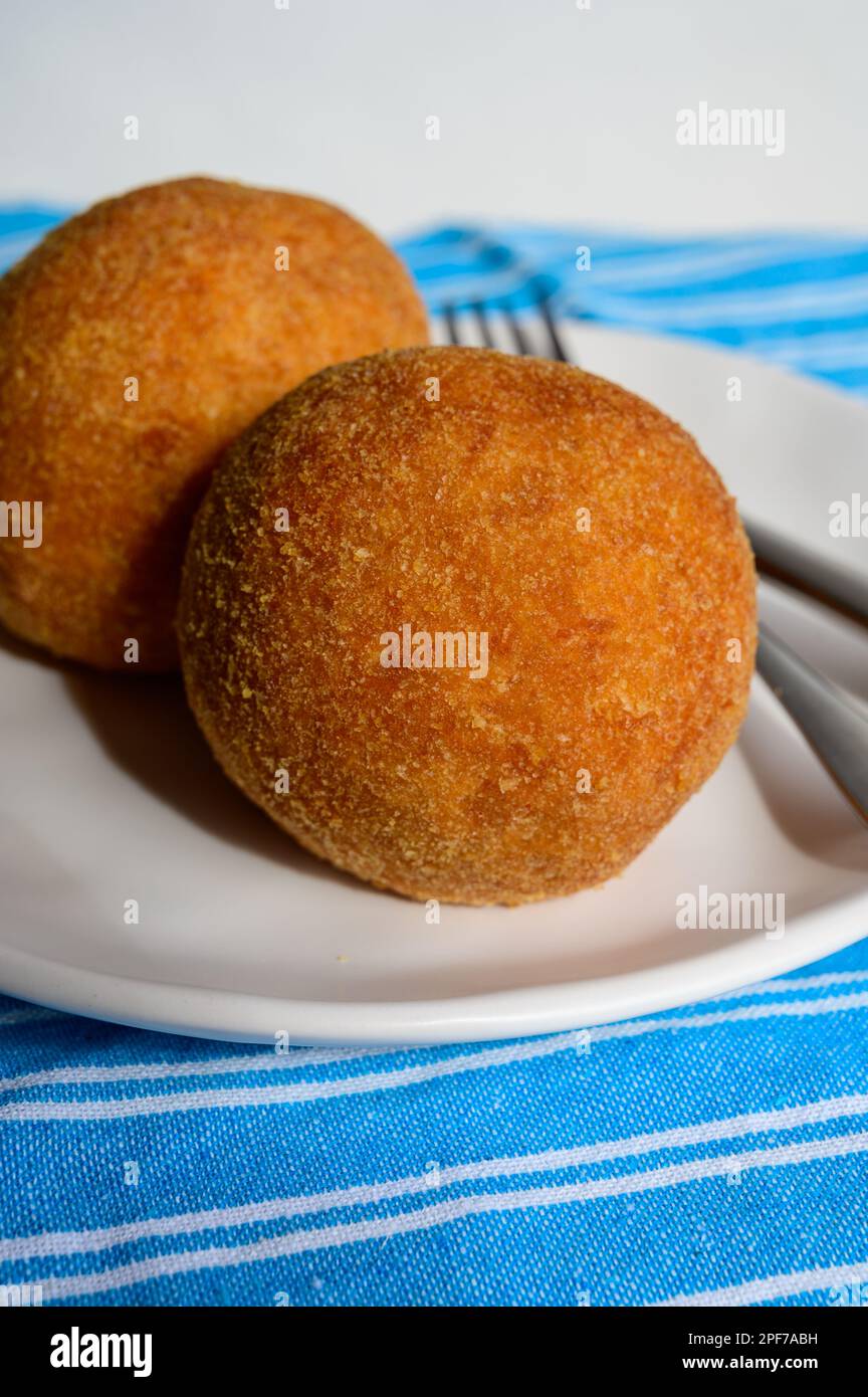 Traditional street food in UK, stuffed fried Scotch eggs with ...
