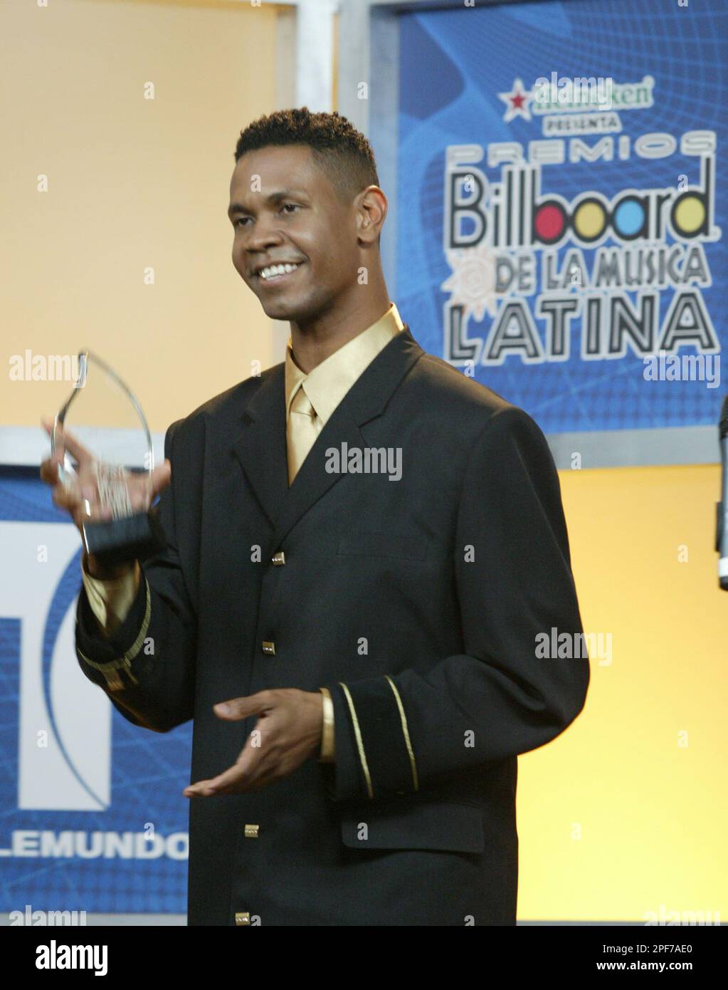 Panamanian rapper El General shows off his "Spirit of Hope" award for ...