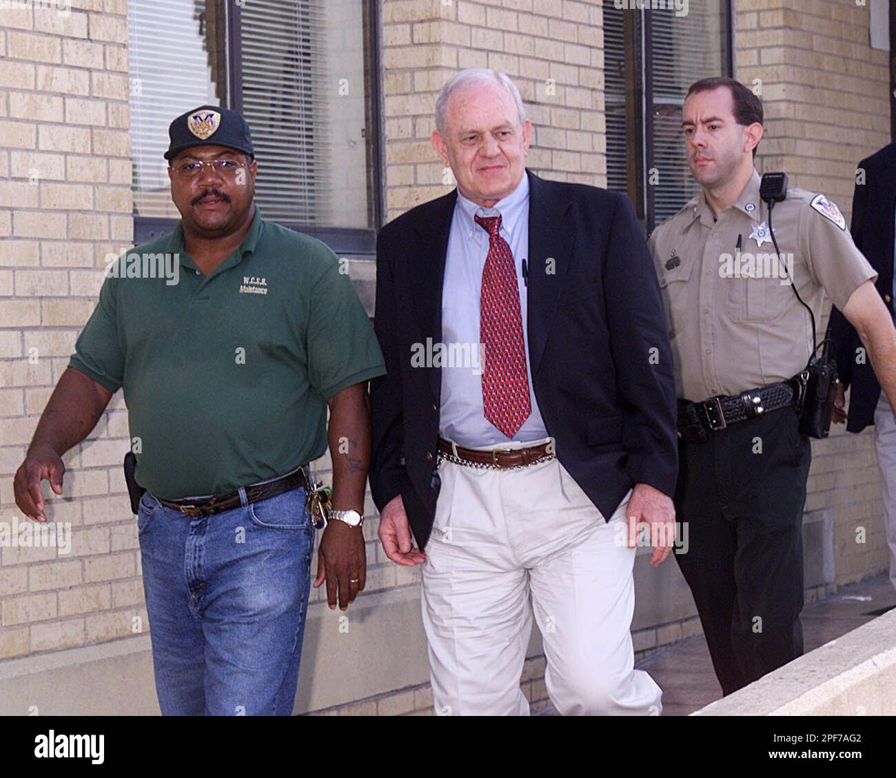 Jimmy Vickers, center, is escorted from the Washington County ...