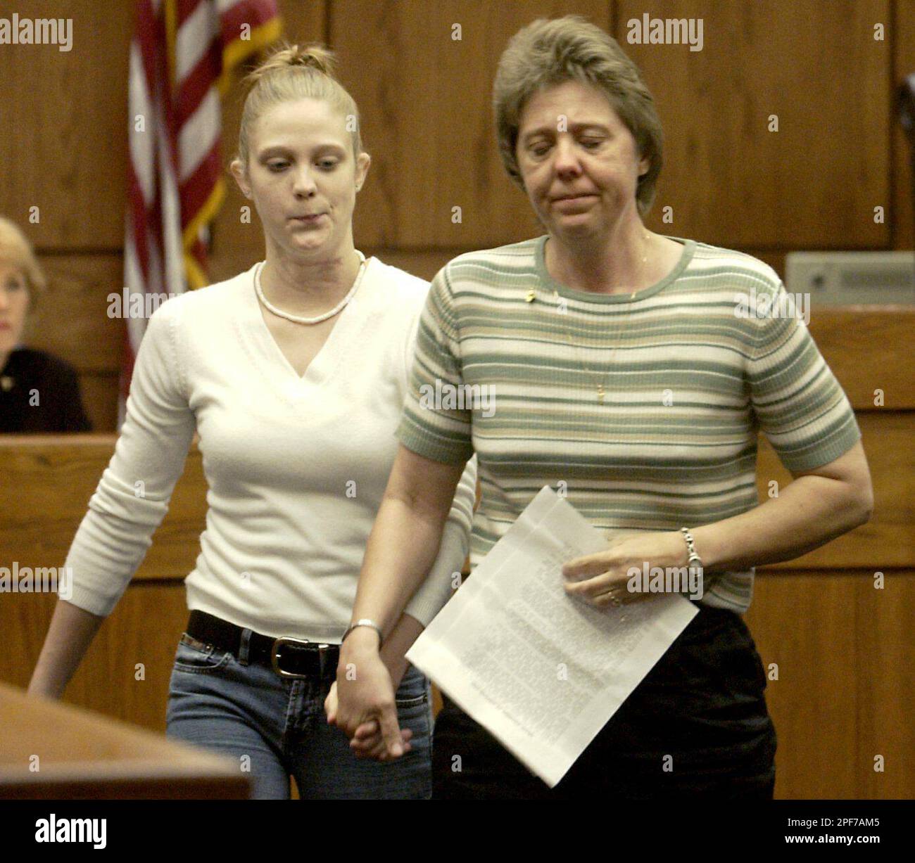Kristie Reed, 18, left, and her mother Lorraine return to the gallery ...