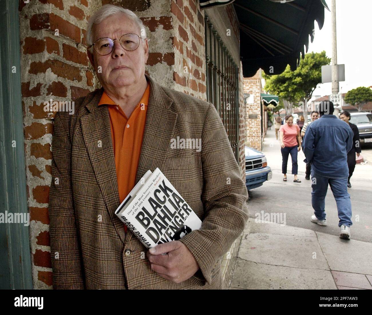 Steve Hodel, a retired police homicide detective, poses while holding ...
