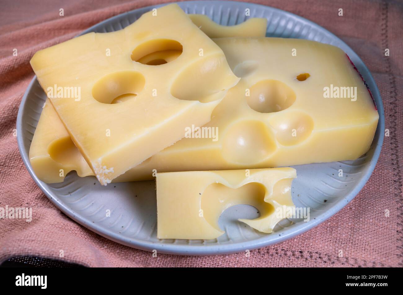 Swiss cheese collection, yellow emmentaler or emmental cheese with ...