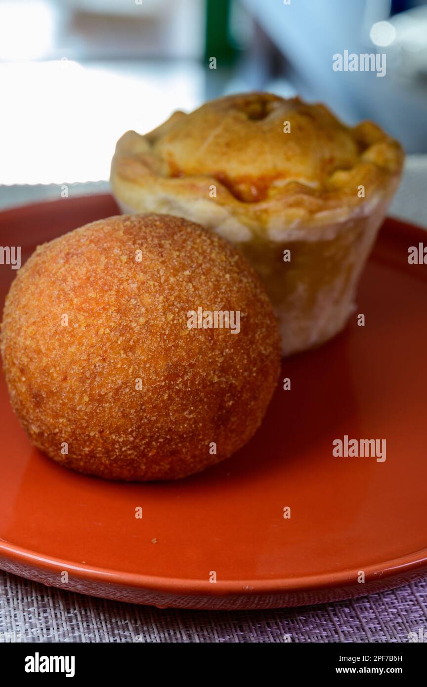 Traditional street food in UK, stuffed fried Scotch eggs with ...