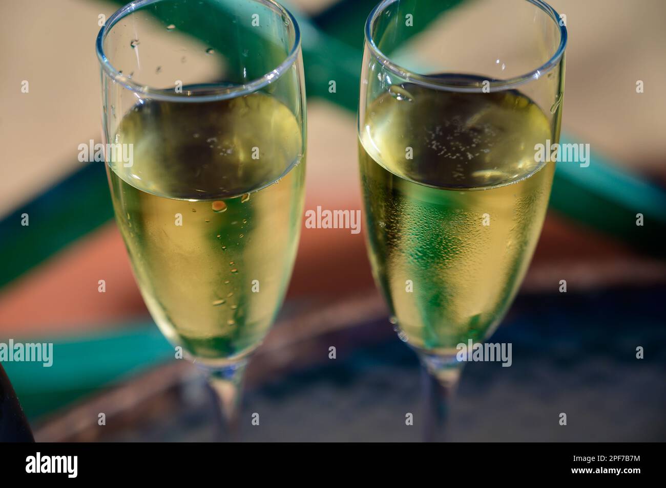 Dinner party, drinking of cava or champagne sparkling wine in vacation ...