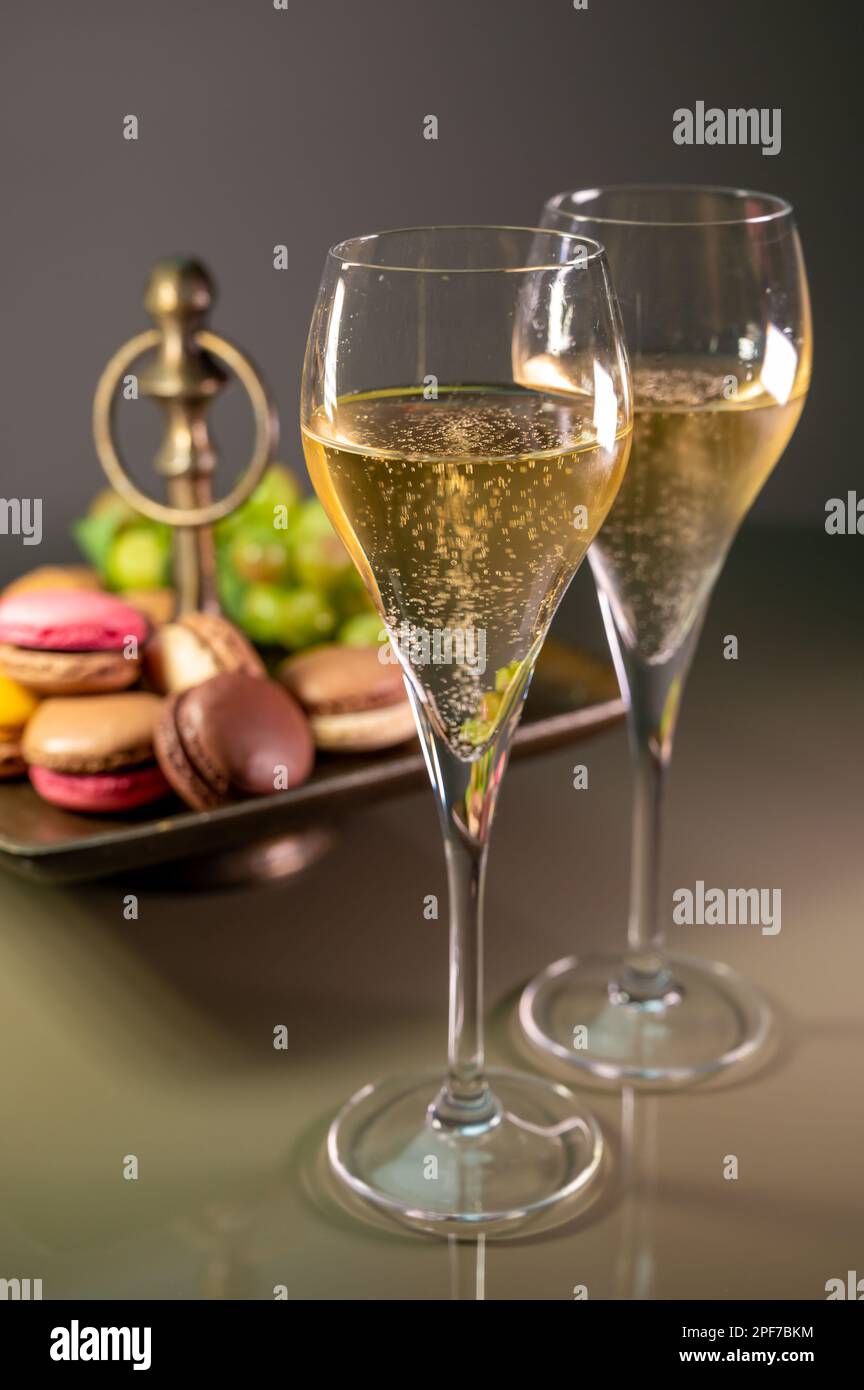 Glasses of sparkling white wine champagne brut or cava with bubbles and ...