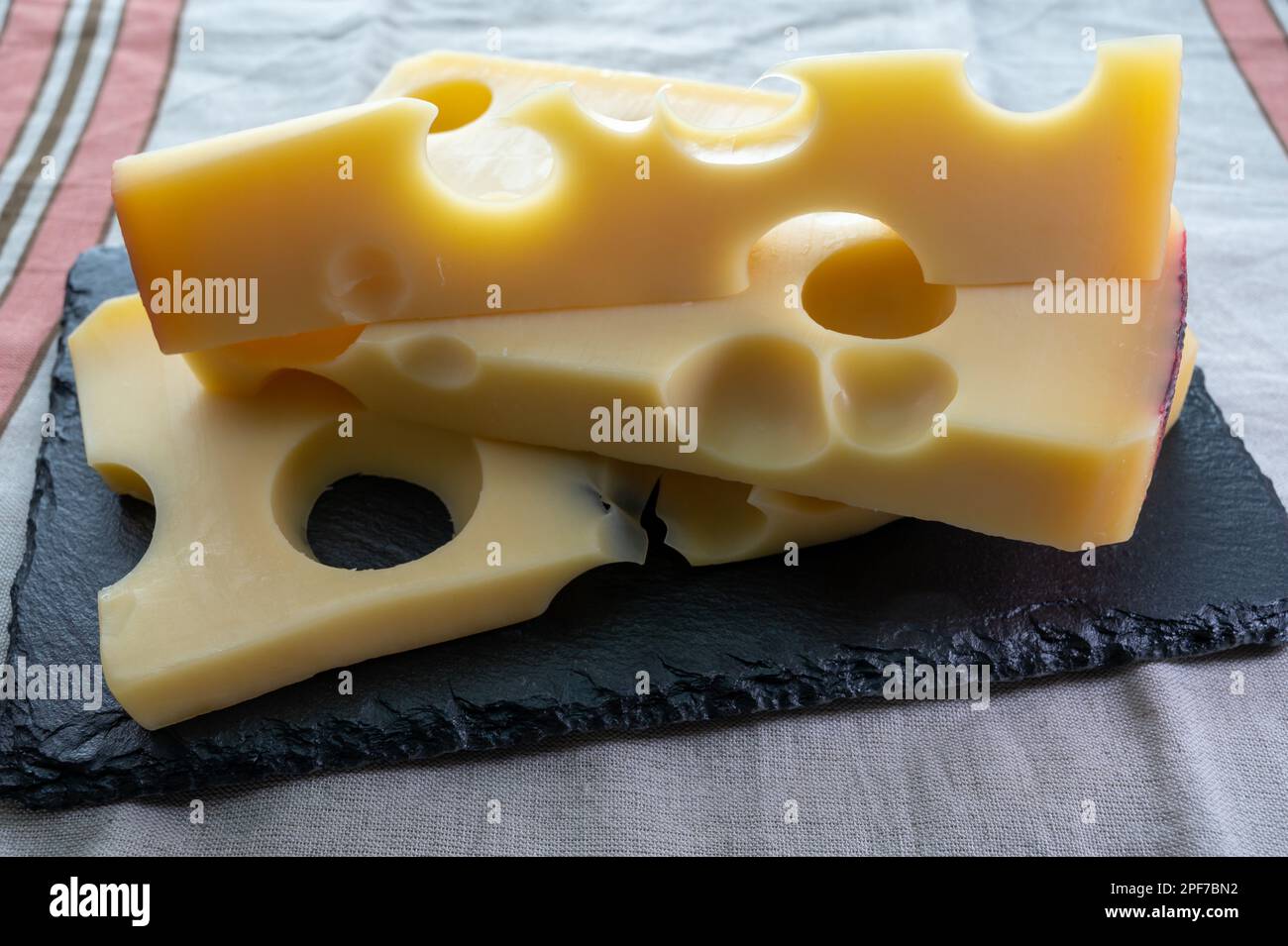 Swiss cheese collection, yellow emmentaler or emmental cheese with ...