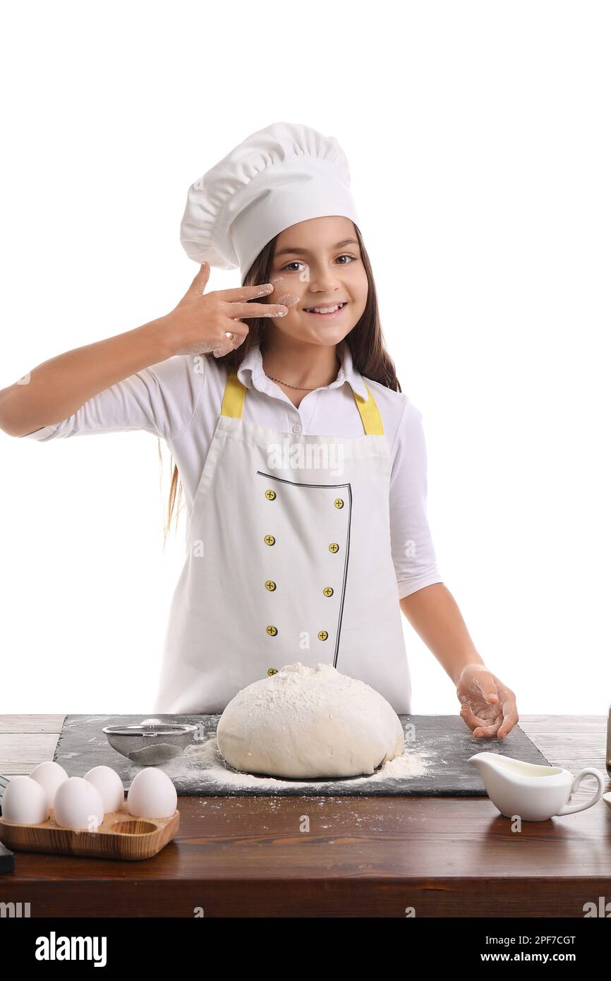 Little baker with flour on white background Stock Photo - Alamy