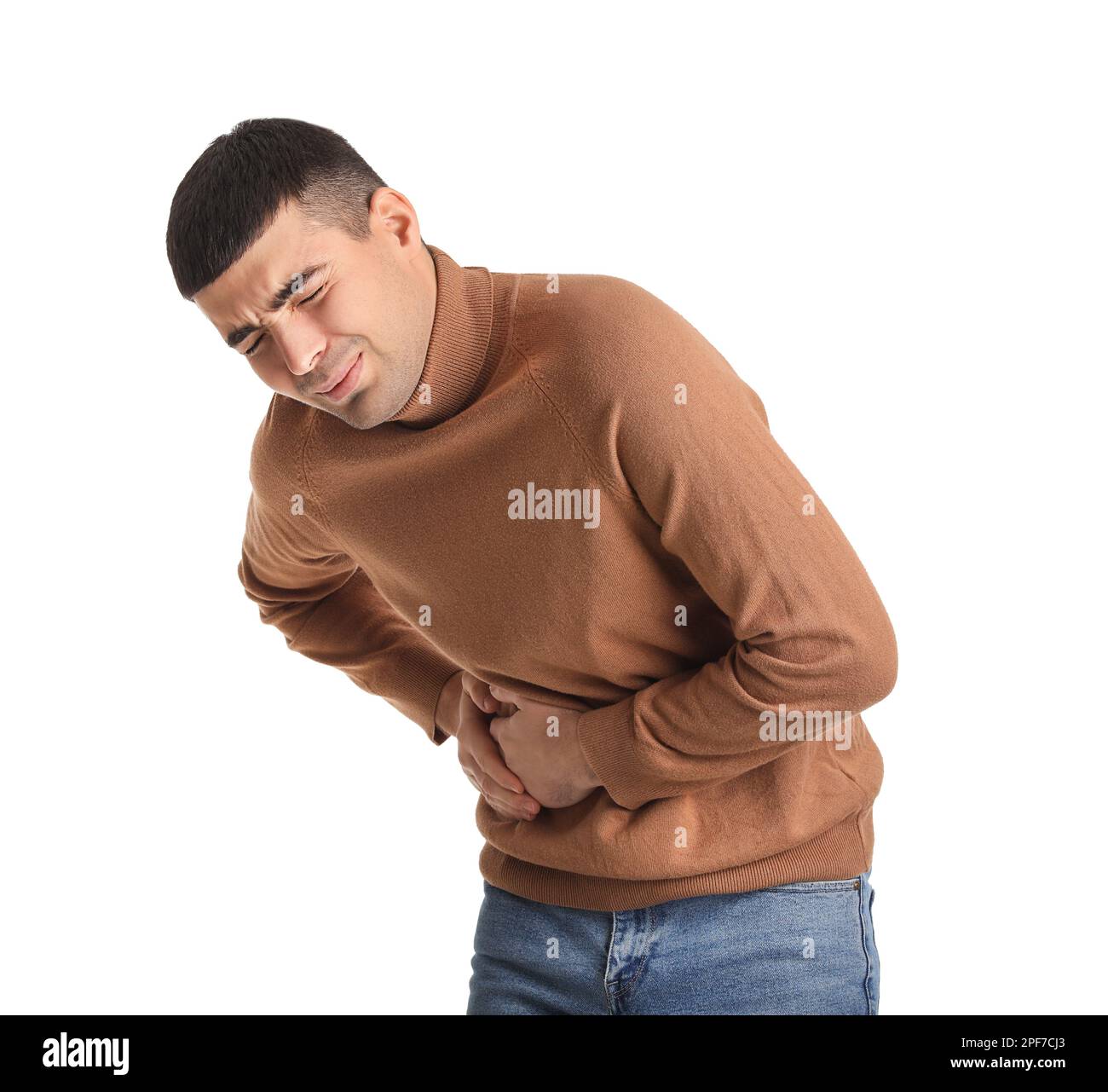 Young man with appendicitis isolated on white Stock Photo - Alamy